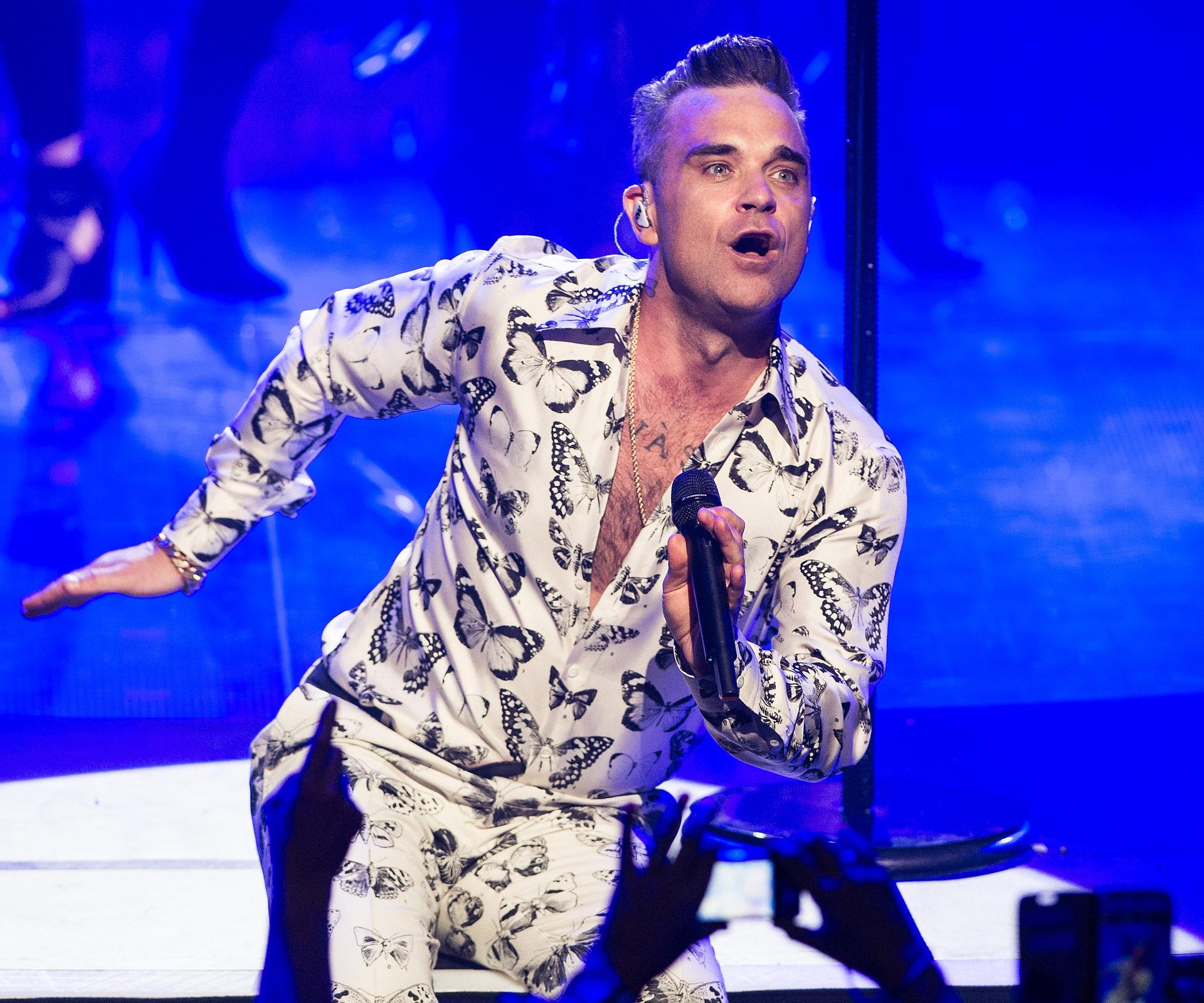 Robbie Williams plastic surgery confession