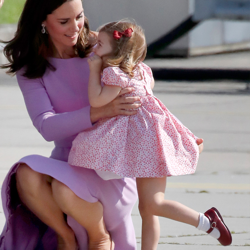 Princess Charlotte throws mini tantrum on the tarmac at Hamburg